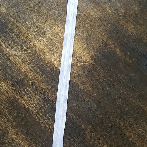 invisible white zipper – The Village of Artisans